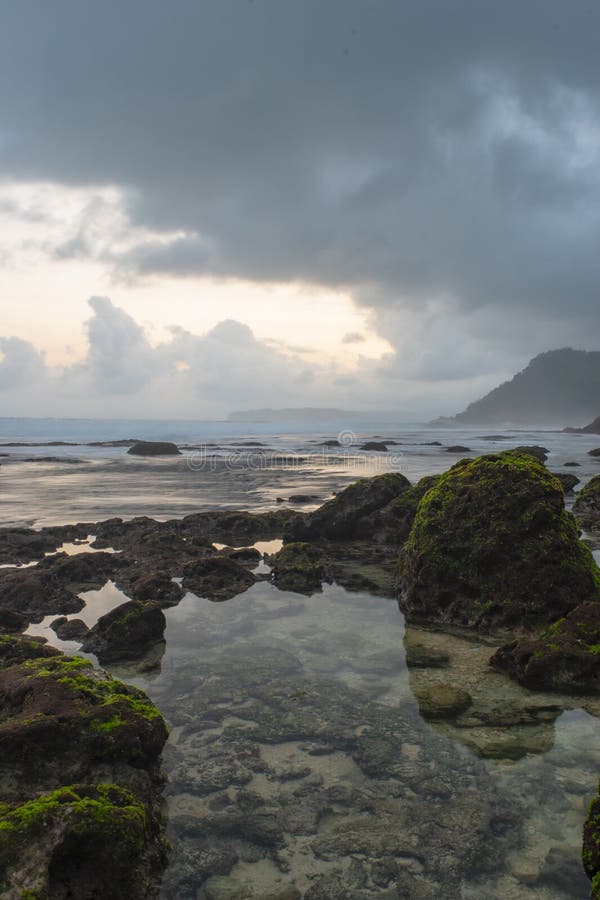 A Clear Tide Pool on the Beach in the Cloudy Afternoon Stock Photo ...