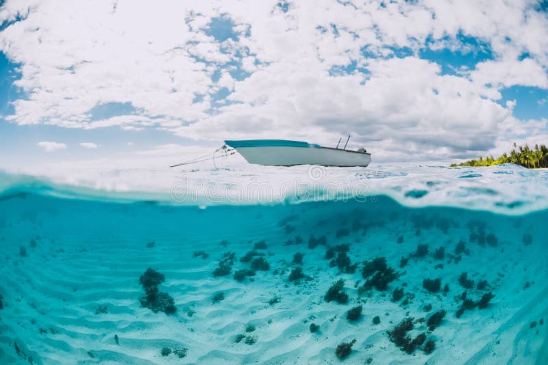 Clear Tropical Ocean Water with Sandy Bottom and Boat Stock Image ...