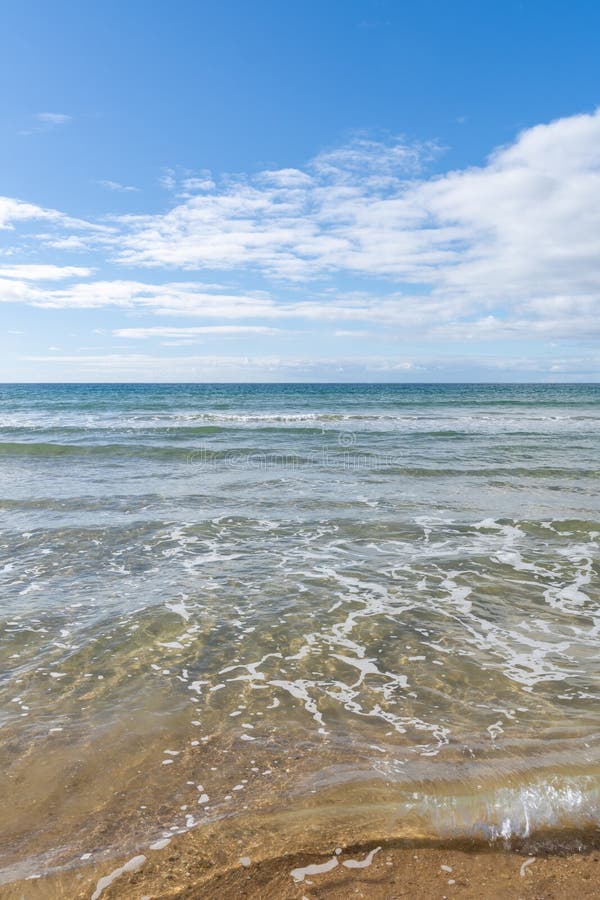 Clear Tropical Ocean Water with Waves on a Golden Sand Beach Stock ...