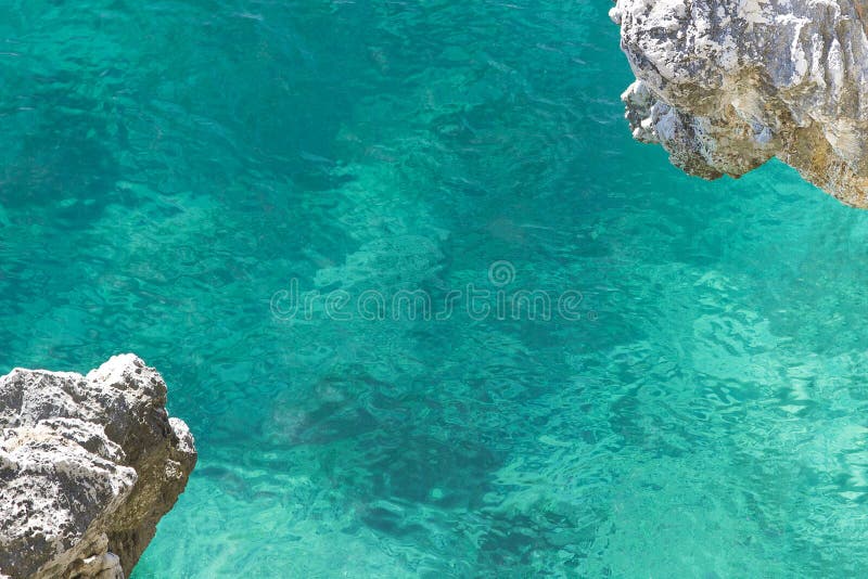 Clear Turquoise Sea Water with a View of the Bottom and Overhanging the ...