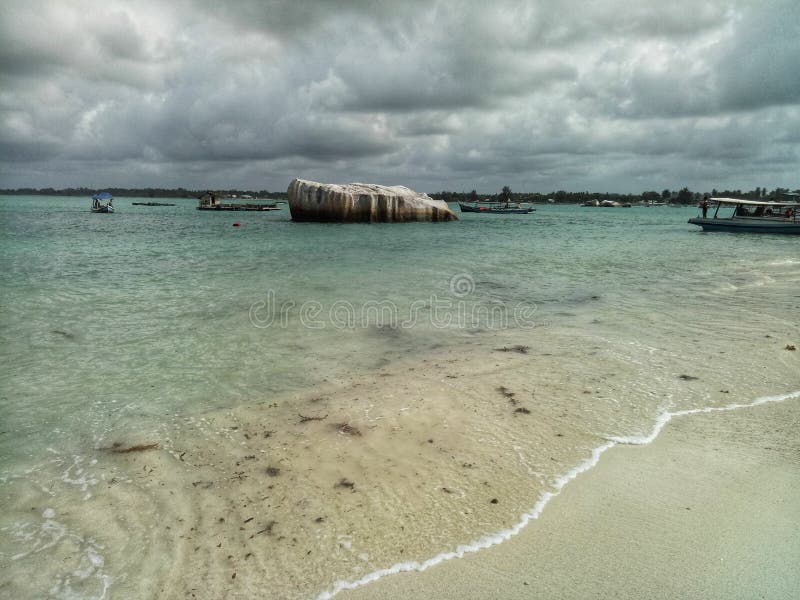 Clear Water in Beach but Dark Clouds are Coming Stock Image - Image of ...