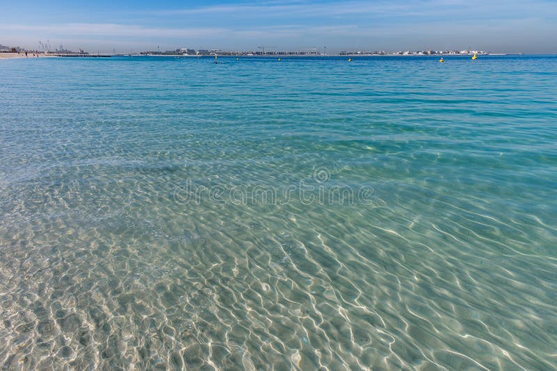 Clear Water Reflections on Shallow Sandy Beach Bottom. UAE Jumeirah ...