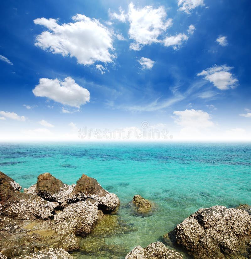 Clear Water and Stone Beach Stock Image - Image of paradise, scene ...