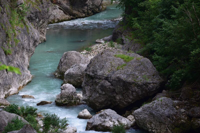 The Clear Water of the Stream Flows between the Rocks Stock Image ...