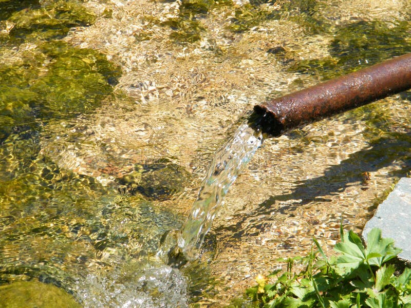 Clear water streaming stock image. Image of rusty, water - 40929611