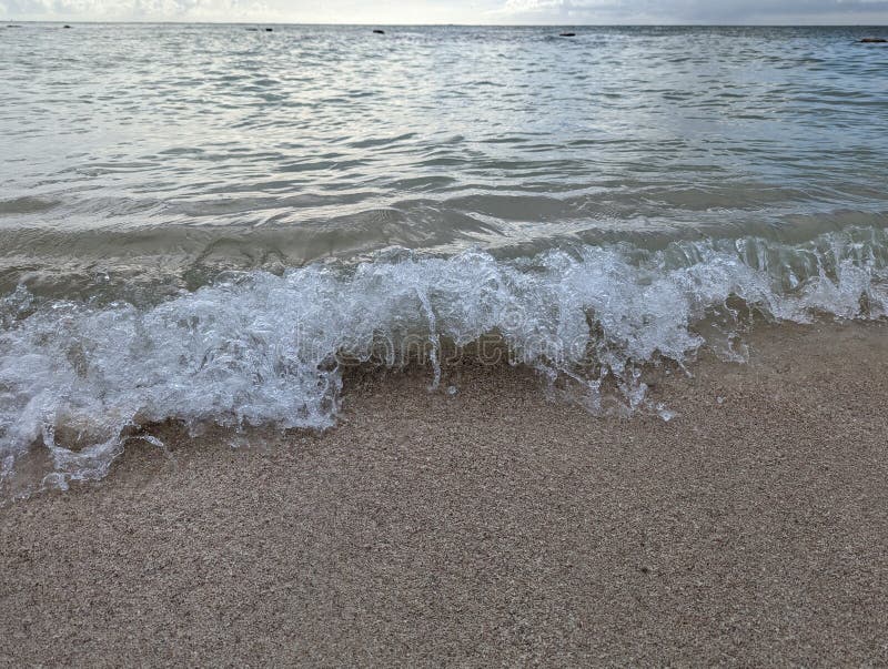 Clear Waves Rolling Onto the Beach Stock Image - Image of waves, beach ...