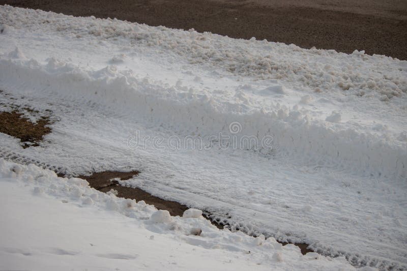 A sidewalk cleared of snow stock photo. Image of wall - 365950522