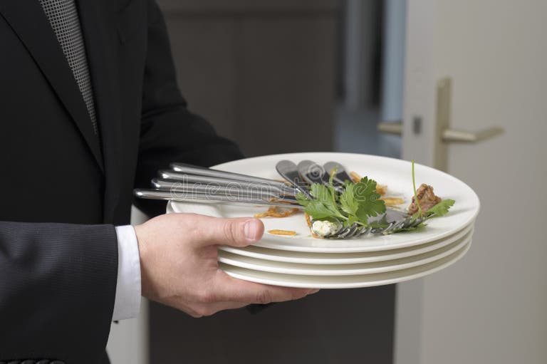 Clearing away the table stock image. Image of gesture - 23707179