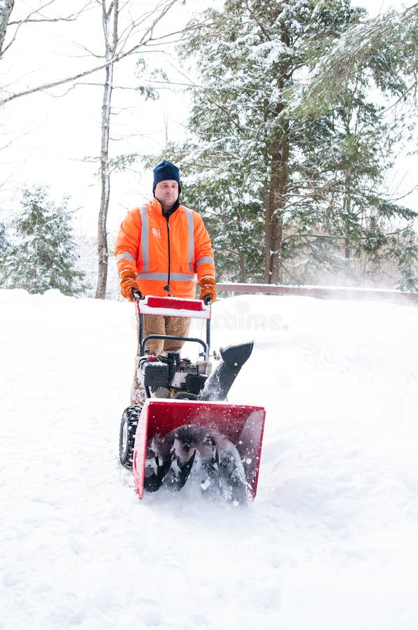 Clearing a Driveway of Snow Stock Image - Image of clearing, seasonal ...