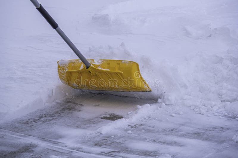 Clearing Snow from Driveway after Heavy Winter Storm Stock Photo ...
