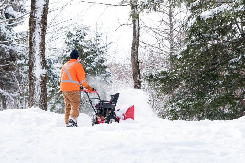 Clearing snow stock photo. Image of cold, snowblower - 56359316 Clearing snow stock photo. Image of cold, snowblower - 56359316