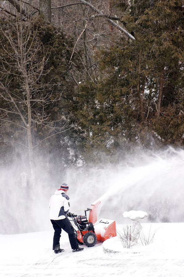 Clearing Snow with a Snowblower Stock Photo - Image of canadian ...