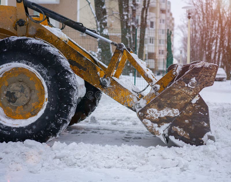 Clearing Snow after a Storm Stock Image - Image of winter, digger ...