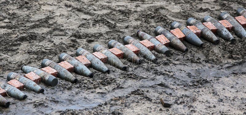 Clearing of Unexploded Ordnance after a Battle in a War, Undermining ...
