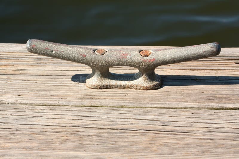 Cleat on a dock stock photo. Image of outdoor, boards - 16875350