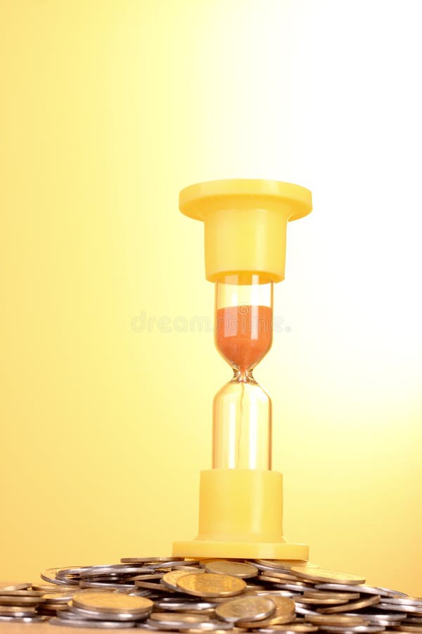 Clessidra Gialla Con Le Monete (ucraine) Immagine Stock - Immagine di ...