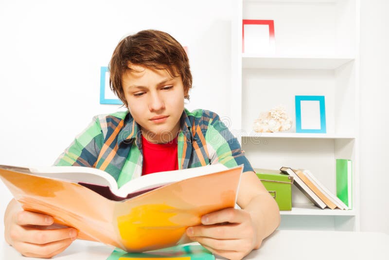 Clever Boy Read Book Sitting by Table Do Homework Stock Photo - Image ...