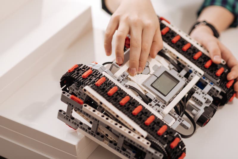 Clever Child Programming Electronic Robot in the Studio Stock Photo ...