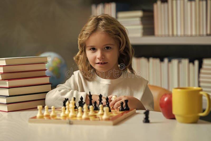 Clever Concentrated and Thinking Kid Boy Playing Chess. Games Good for ...