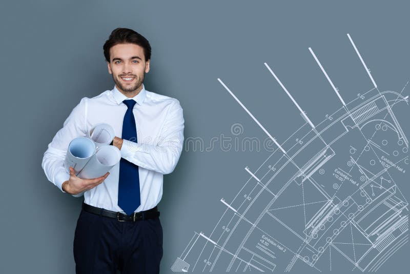 Confident Engineer Holding Blueprints and Smiling Stock Image - Image ...