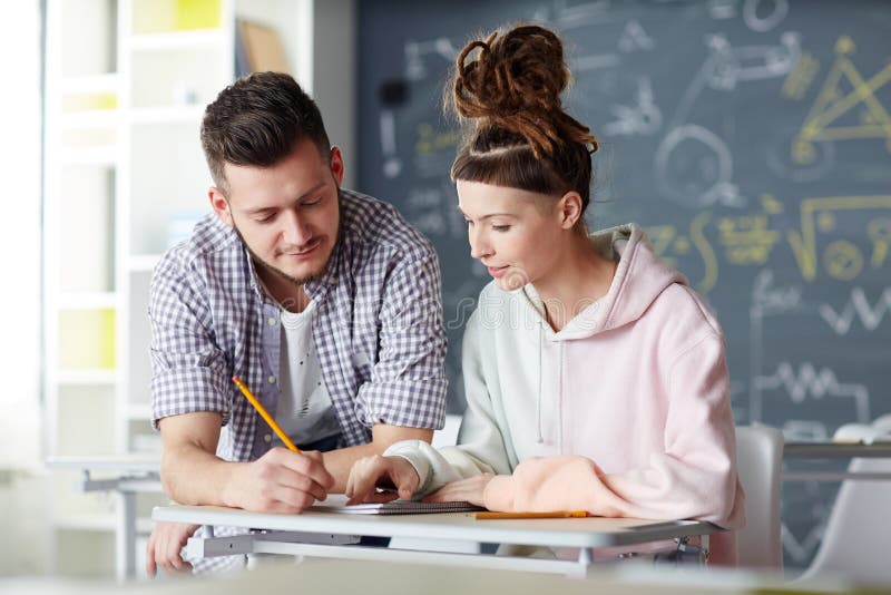 Reading notes at break stock photo. Image of discussing - 114428142