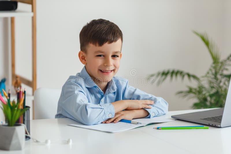 Clever Kid Doing Homework Using Laptop and Internet Stock Image - Image ...