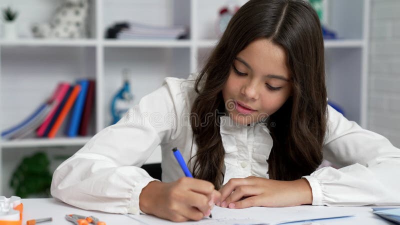 Clever Kid Writing with Pan at School Lesson in Classroom, Get Smart ...