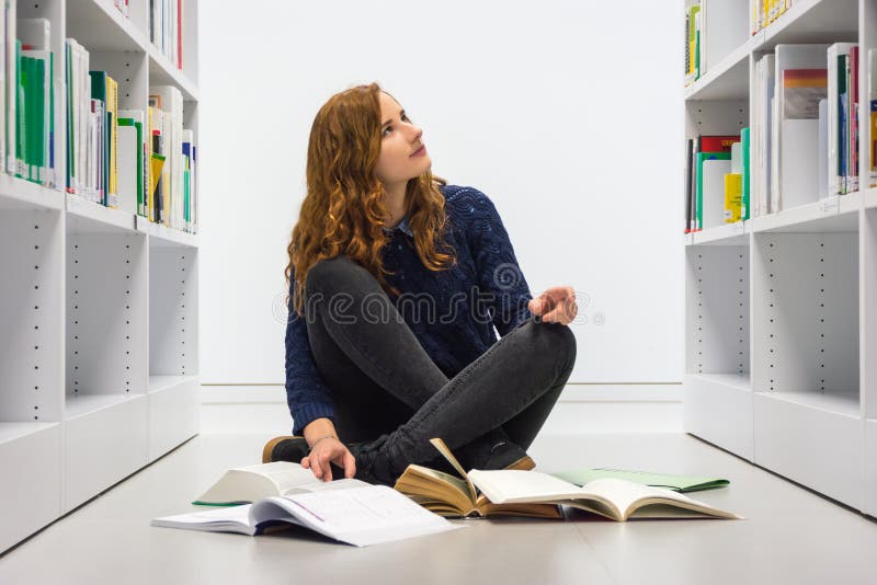 Clever University Student Studying in White Modern Library Books Stock ...