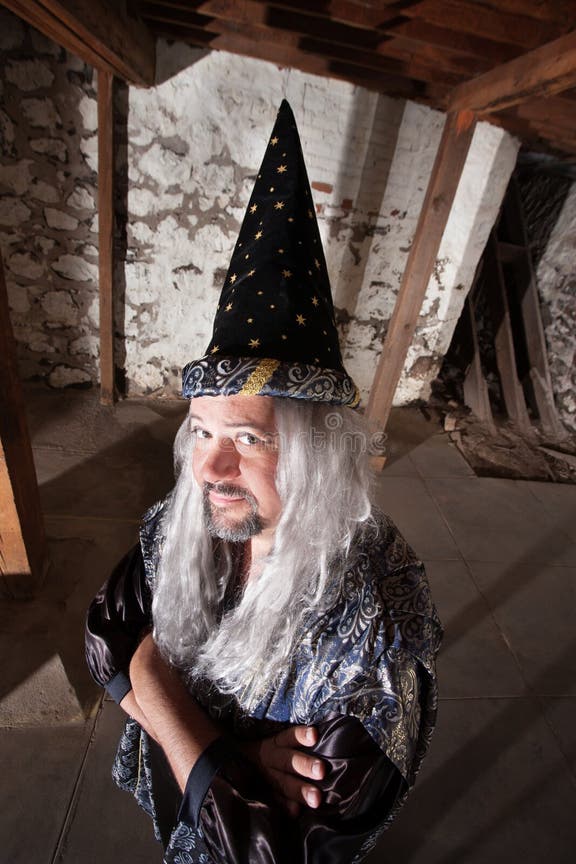 Clever Wizard stock image. Image of arms, middle, magician - 28555825