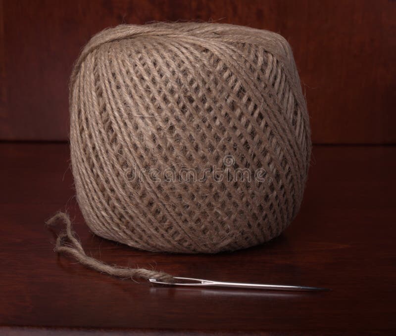 Natural clew in hands stock image. Image of cozy, material - 85032151