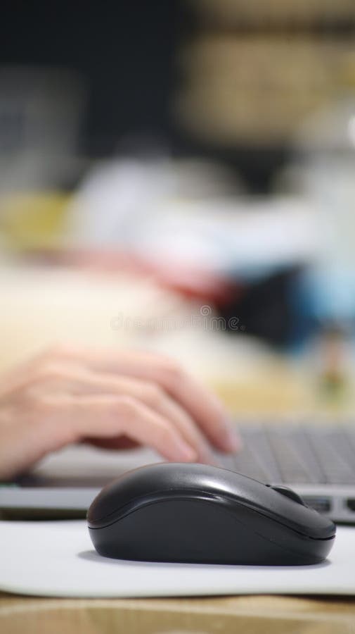 Click Black Computer Mouse on a Work Desk. Working with a PC or Laptop ...