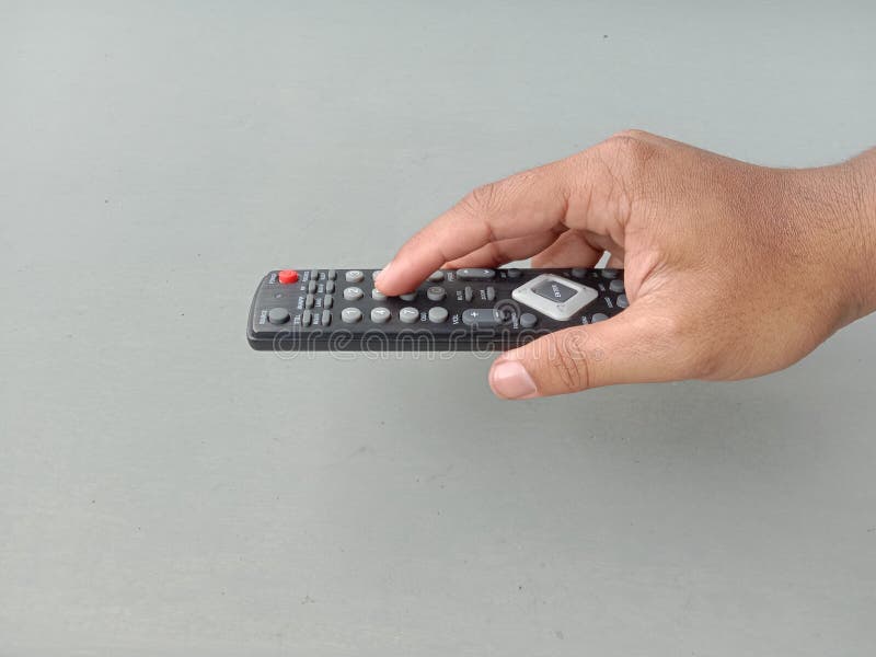 Click the Television Remote Button with a Gray Background Stock Image ...