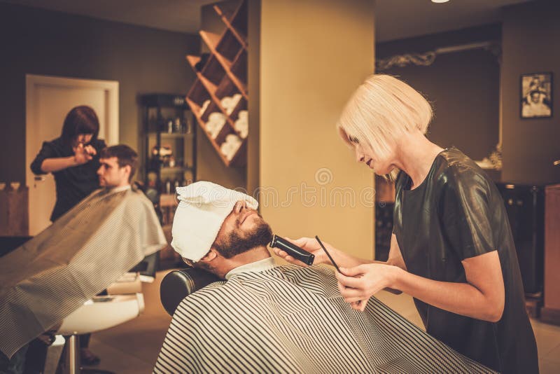 Client in a barber shop stock image. Image of cutting - 57163799