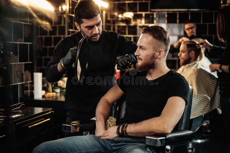 Client in barber shop stock photo. Image of accessories - 56590304