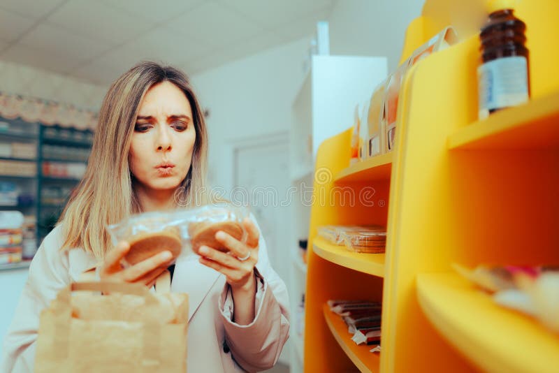 Customer Reading the Label of Ingredients and Caloric Information Stock ...