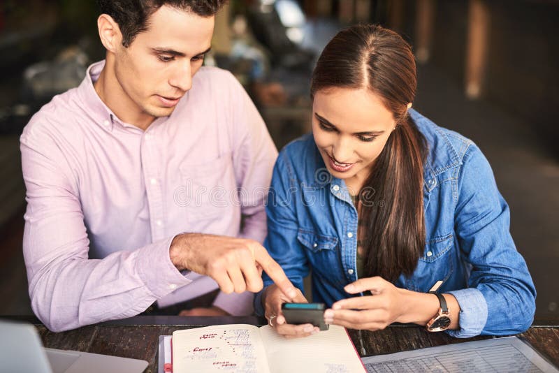 The Client Just Sent Us a Message. Two Designers Having a Meeting at a ...