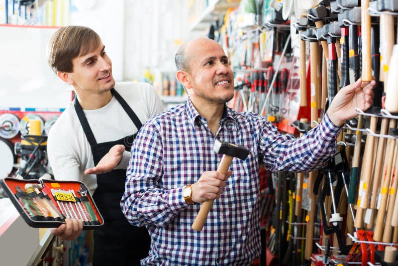 Client and Salesman at Tooling Section Stock Image - Image of building ...