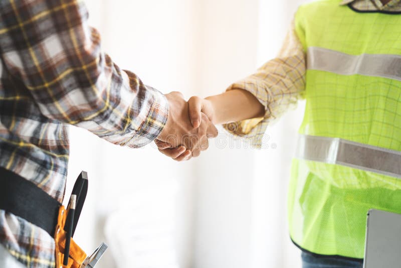 Client Shaking Hands with Team Builder in Renovation Site Stock Photo ...