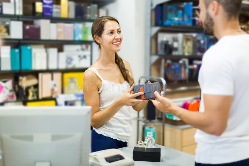 Paying at a cash register stock photo. Image of mall - 34347174