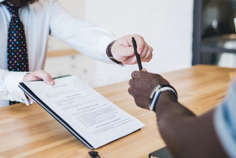 Client Signing Contract with Realtor Stock Image - Image of contract ...