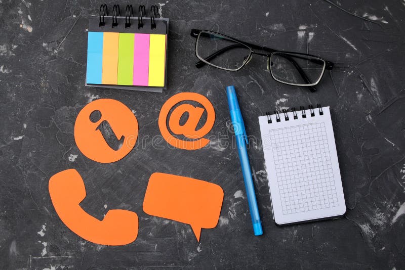 Client Support Service. Contact Us for Feedback. Desktop with Notepad ...