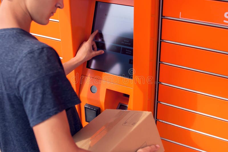 Client Using Automated Self Service Post Terminal Machine or Locker To ...