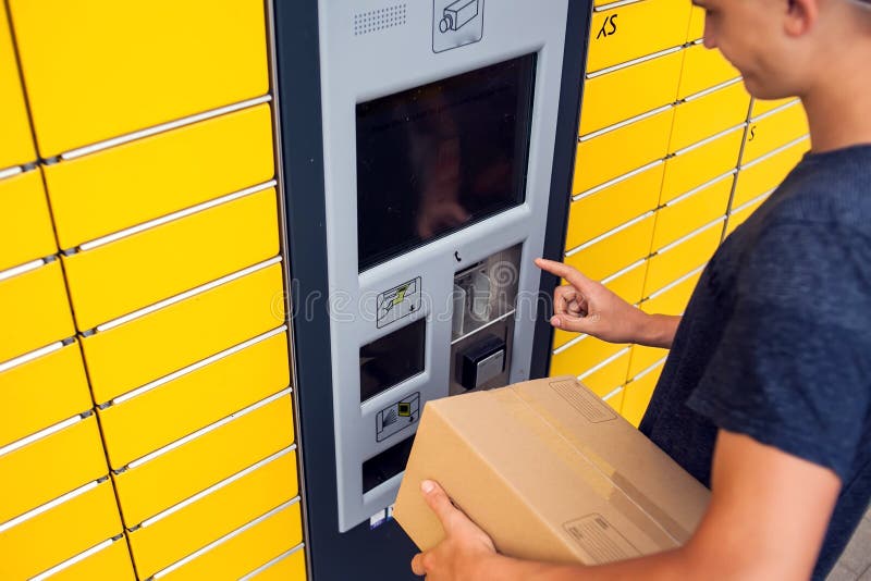 Client Using Automated Self Service Post Terminal Machine or Locker To ...