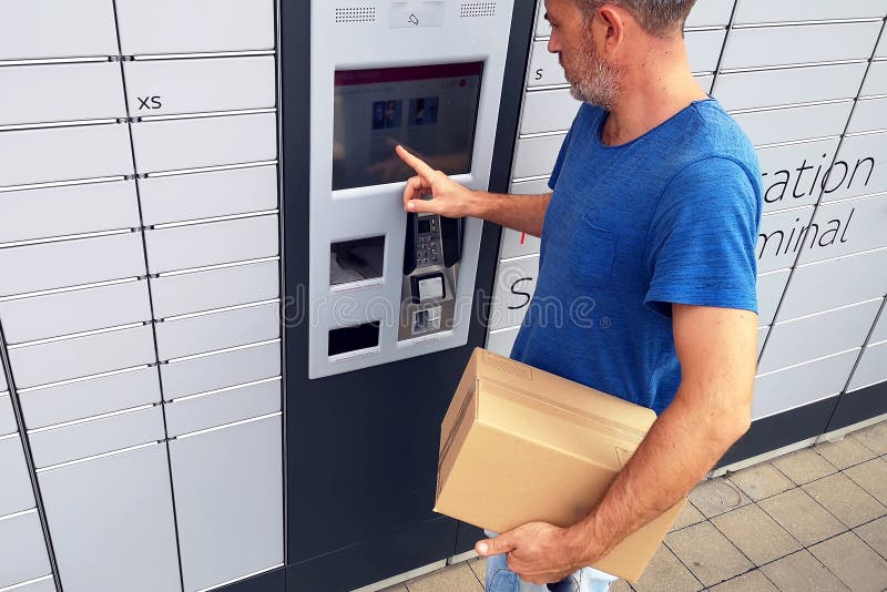 Client Using Automated Self Service Post Terminal Machine or Locker To ...