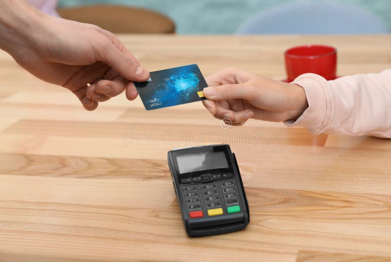 Client Using Credit Card Machine for Non Cash Payment Stock Photo ...