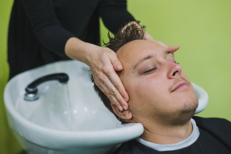 Client washing head stock image. Image of hairdresser - 79044495