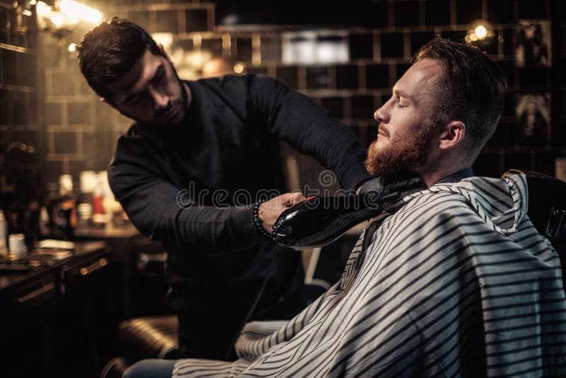 Clients in barbershop stock photo. Image of accessories - 134321682