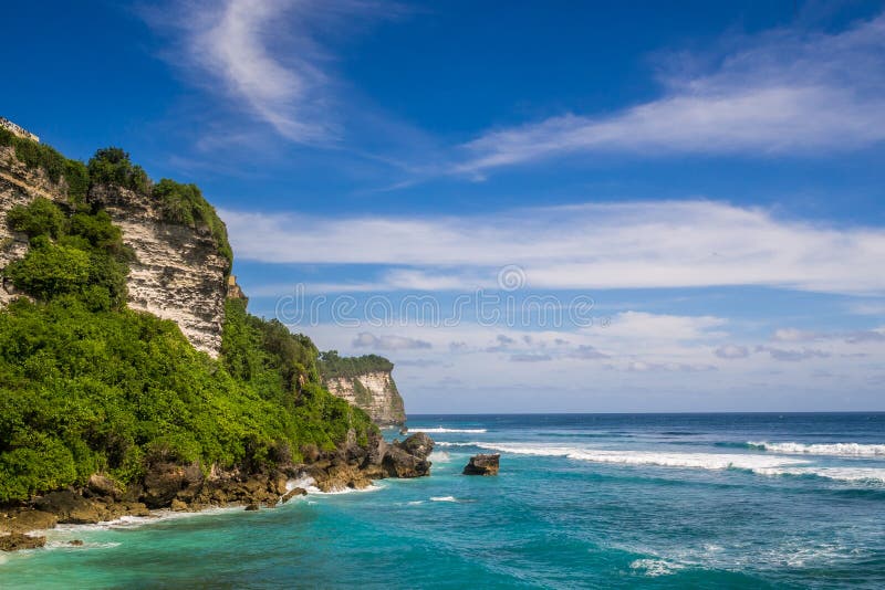 A Cliff, Blue Water and Clear Sky Stock Photo - Image of coast, hill ...