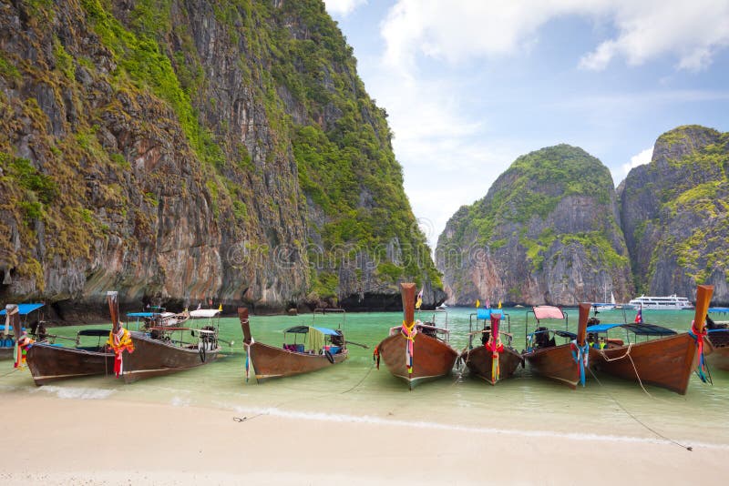 Cliff and boats stock photo. Image of island, rock, clear - 24690812