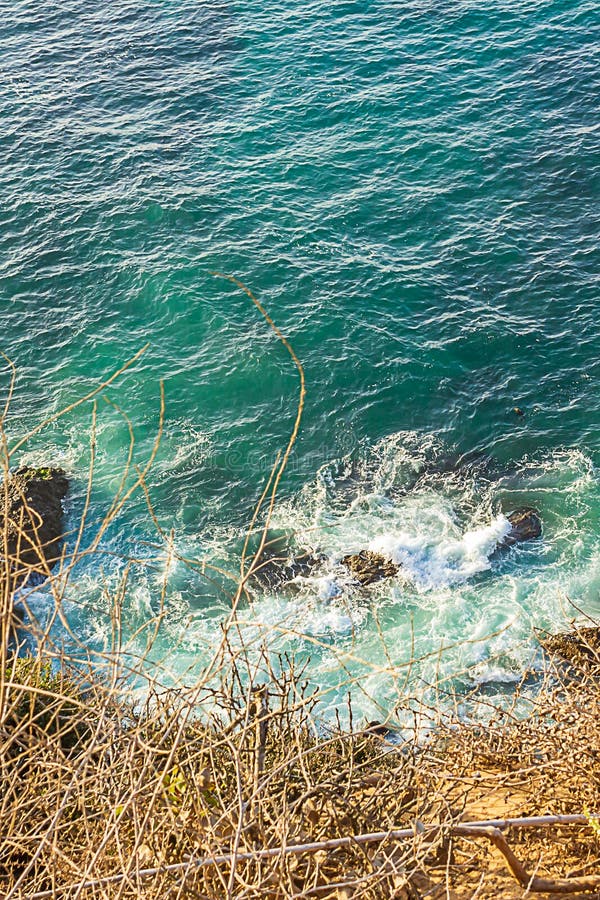 Cliff Edge View of Ocean Wave Movement on Rocks with Foam and Splashing ...